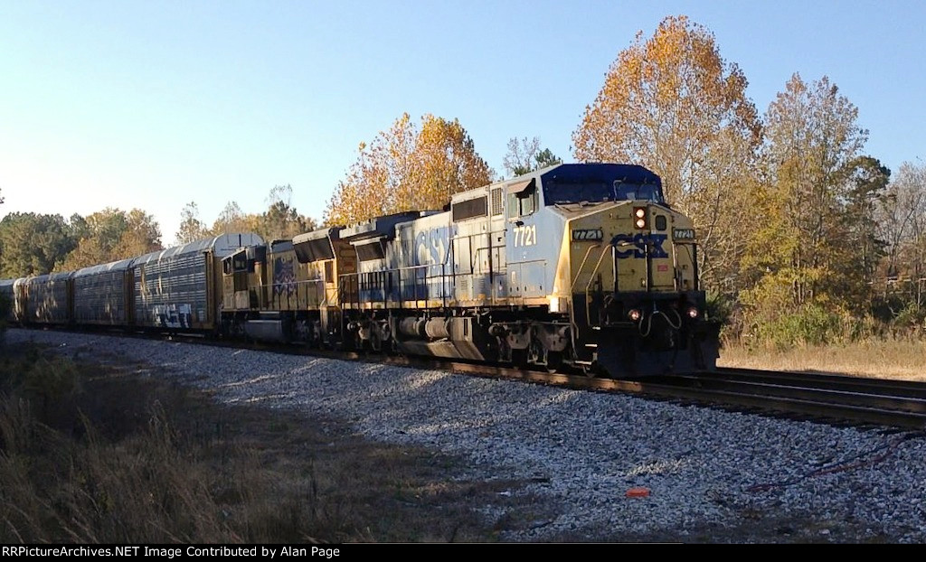 CSX C40-8W 7721 and UP SD70M 5118